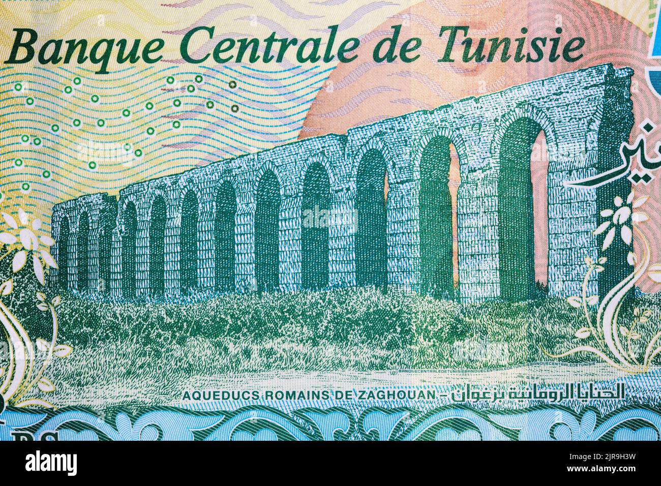 Roman aqueducts of Zaghouan from Tunisian money - Dinars Stock Photo ...