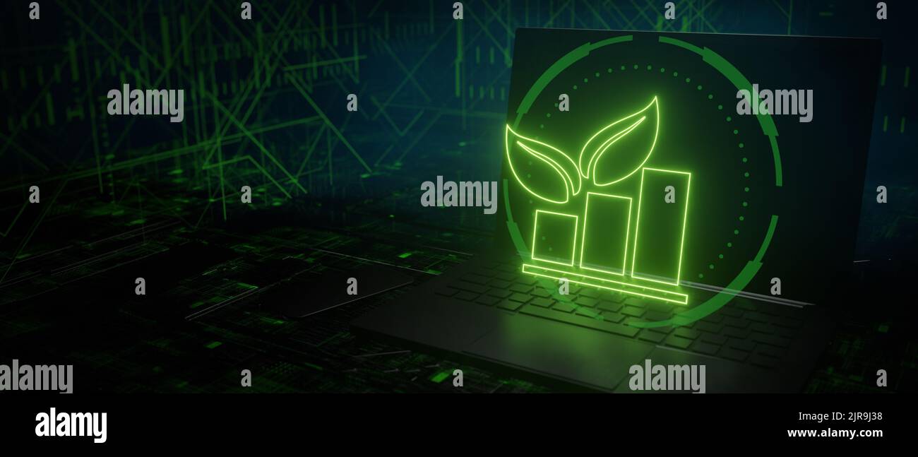 Laptop keyboard with plant growing on it. Green IT computing concept ...