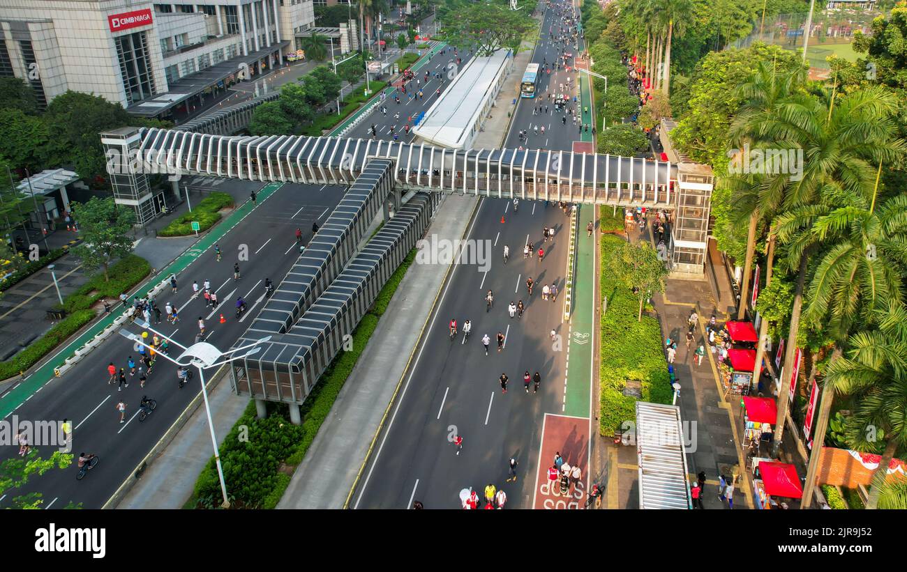 Aerial view of the A crowd of people enjoy Sunday morning near Bunderan ...