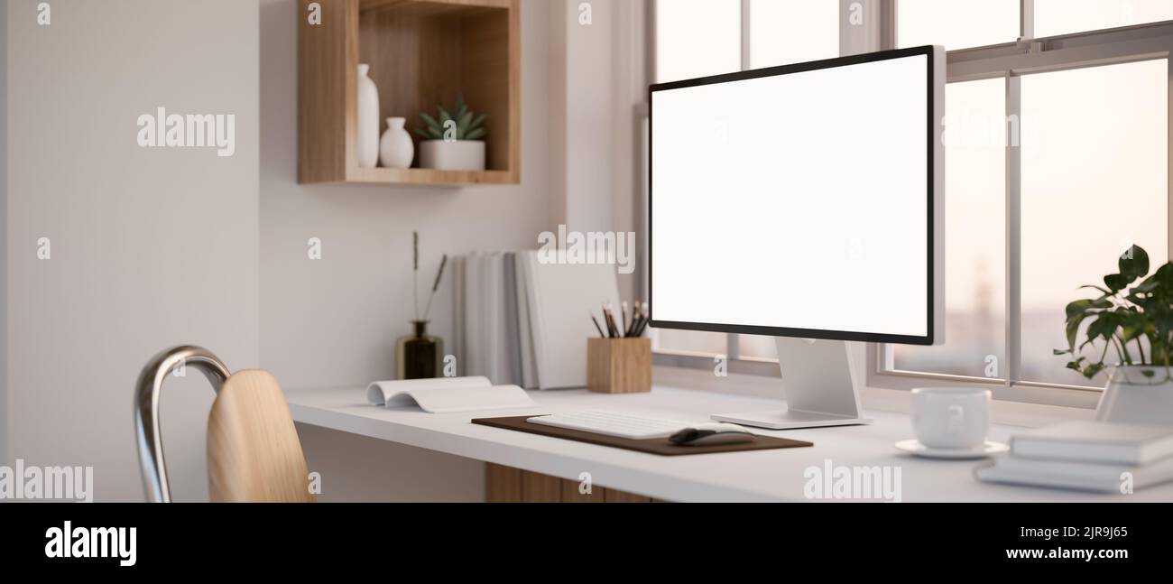 Modern white working space interior design with PC desktop computer ...