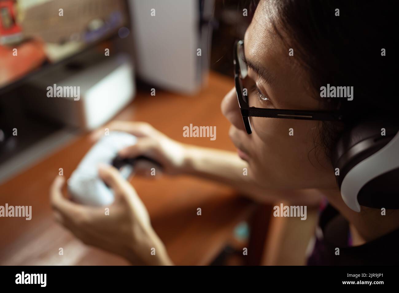 Gamer playing game with a game controller Stock Photo - Alamy