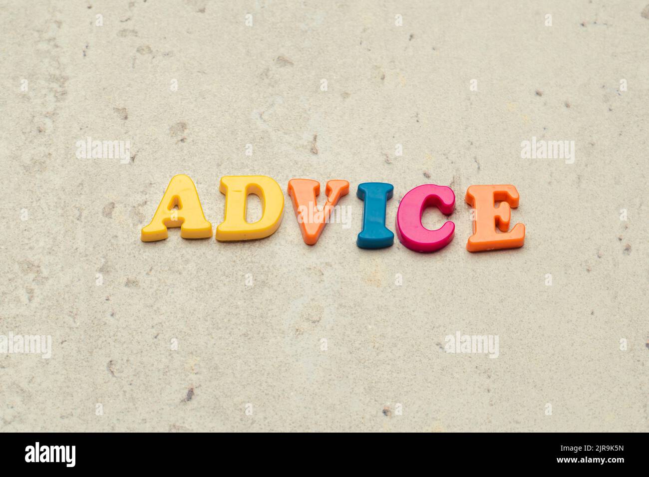 Colorful letters on background closeup, word advice Stock Photo - Alamy