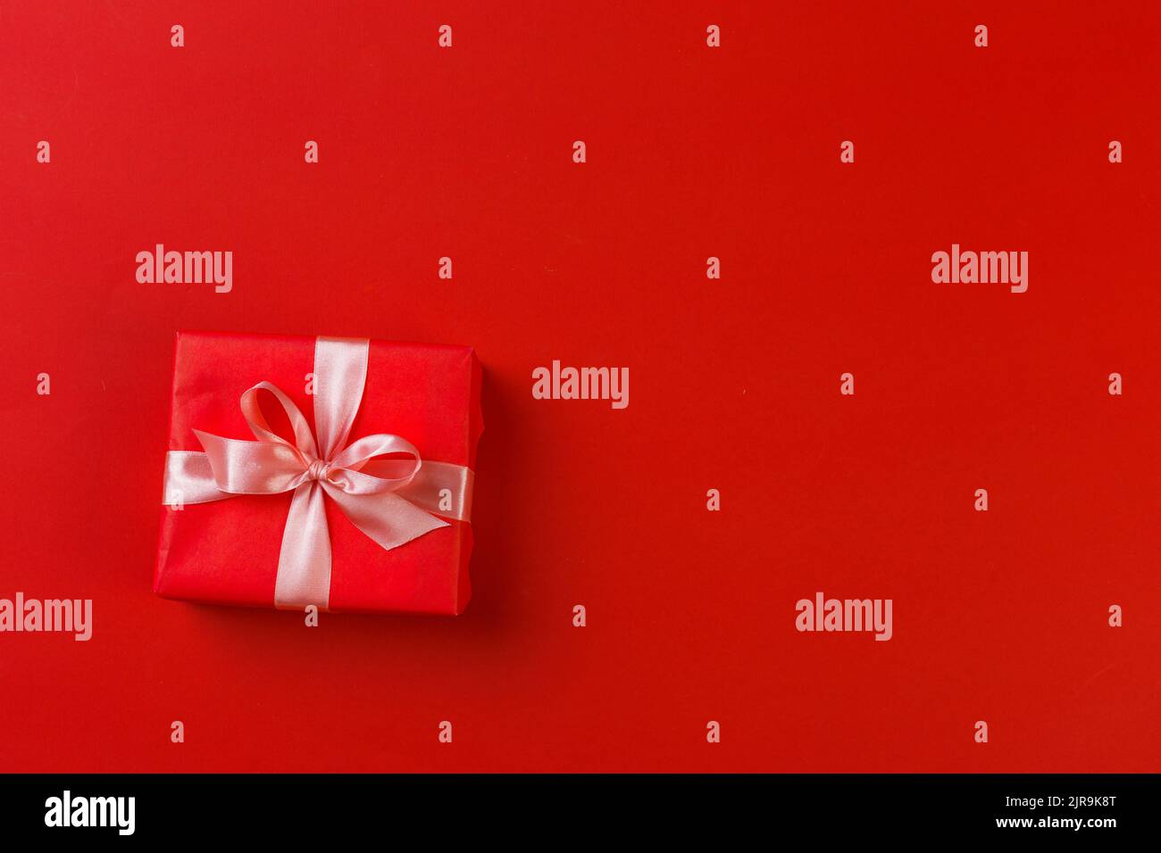 gift box on color background Stock Photo - Alamy