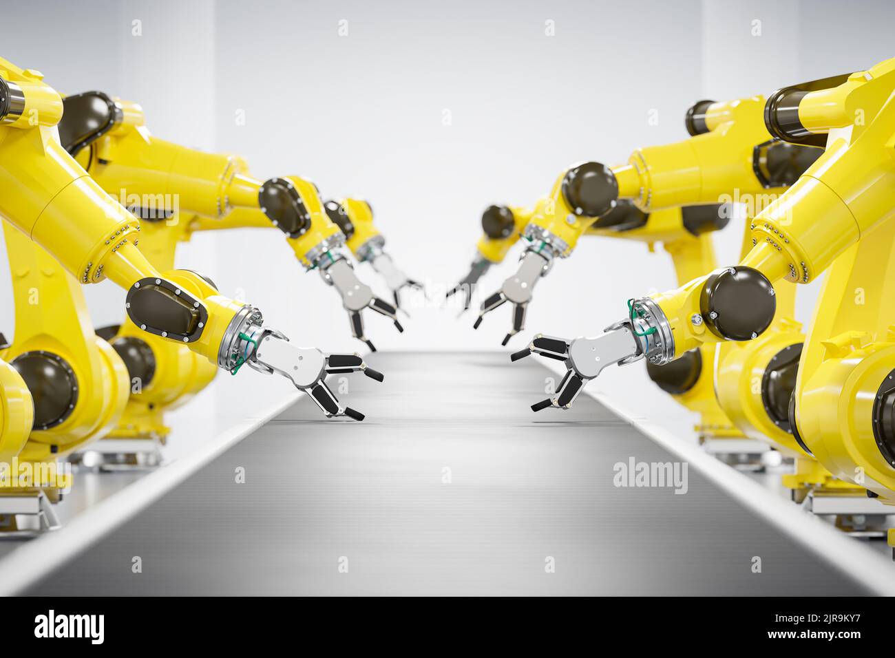 Robots at a conveyor belt Stock Photo - Alamy