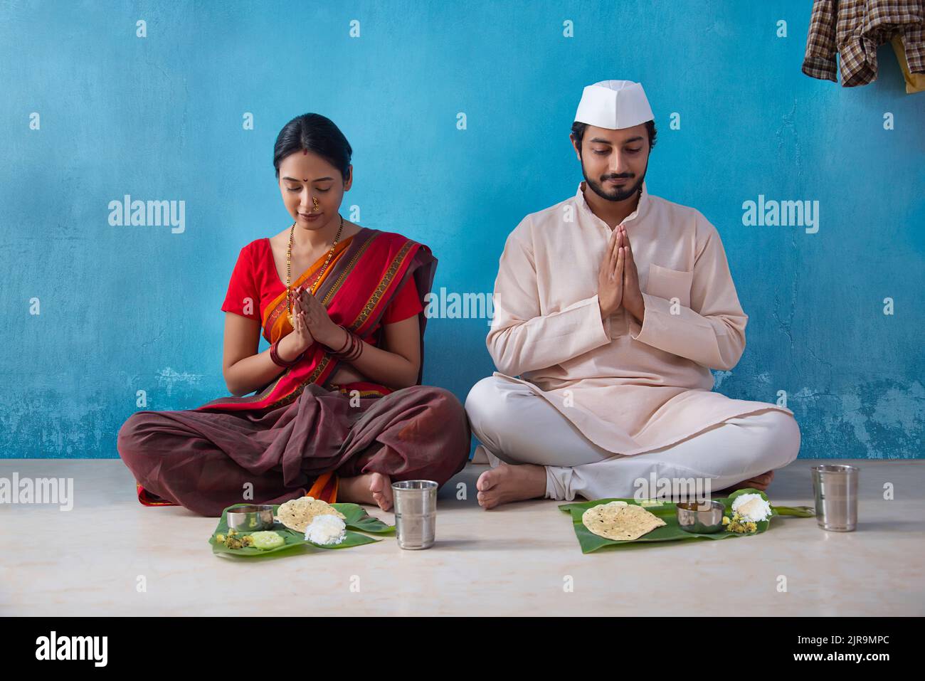 Female praying before image hi-res stock photography and images - Alamy