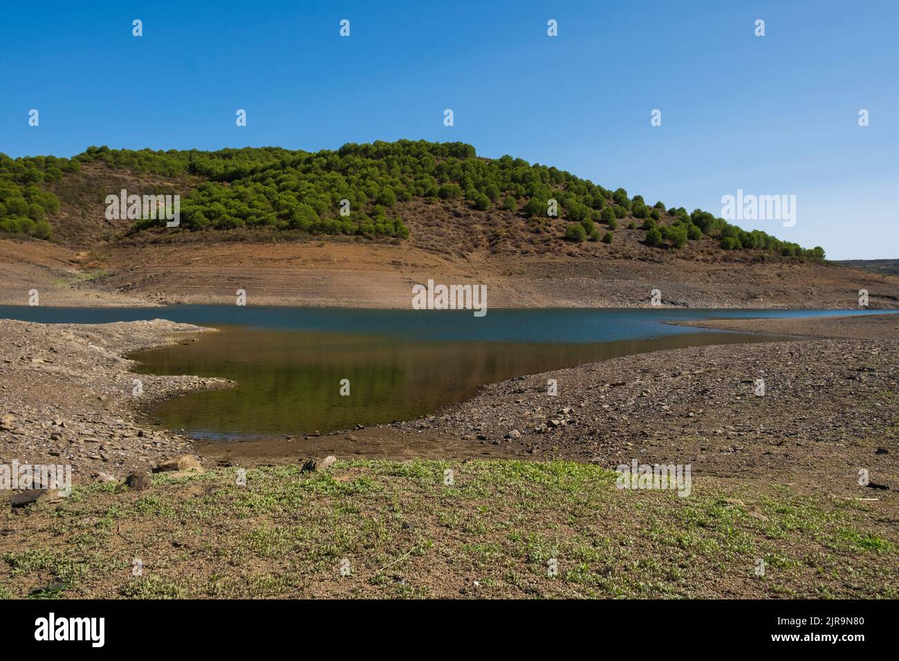 Low levels of water at a reservoir showing the effects of a hot summer ...