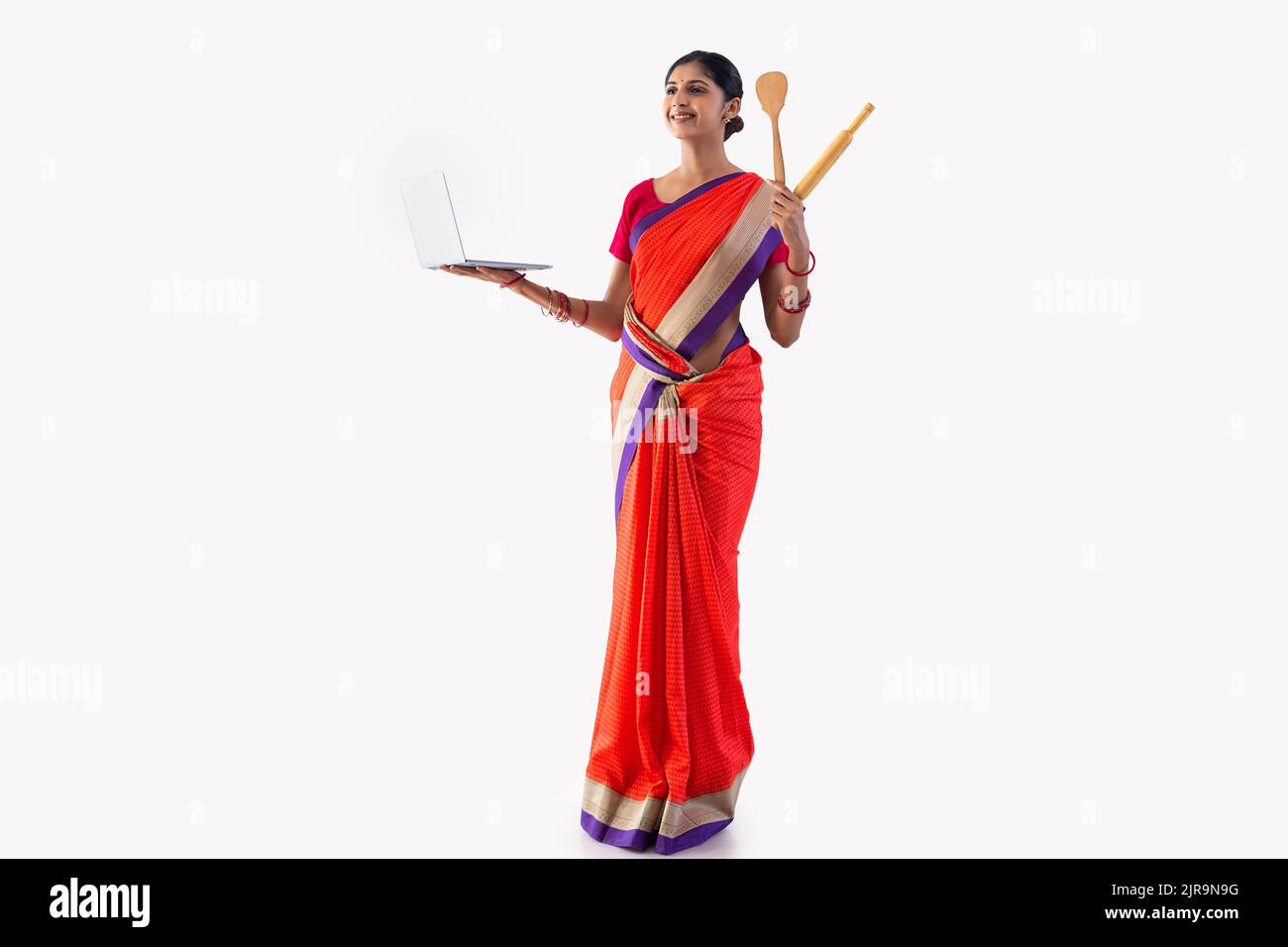 Woman multitasking arms hi-res stock photography and images - Alamy