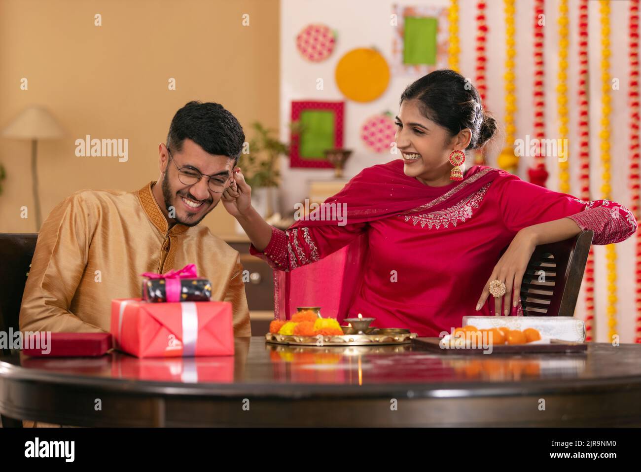 Ear pulling hi-res stock photography and images - Alamy