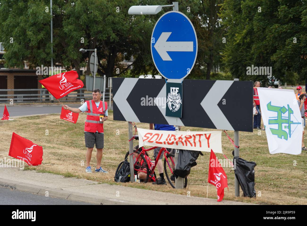 Members of the Unite union man a picket line at one of the entrances to ...