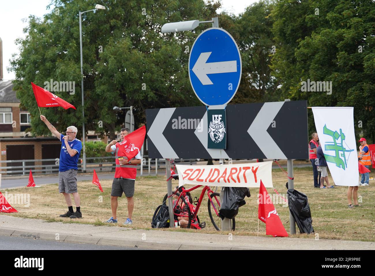 Members of the Unite union man a picket line at one of the entrances to ...