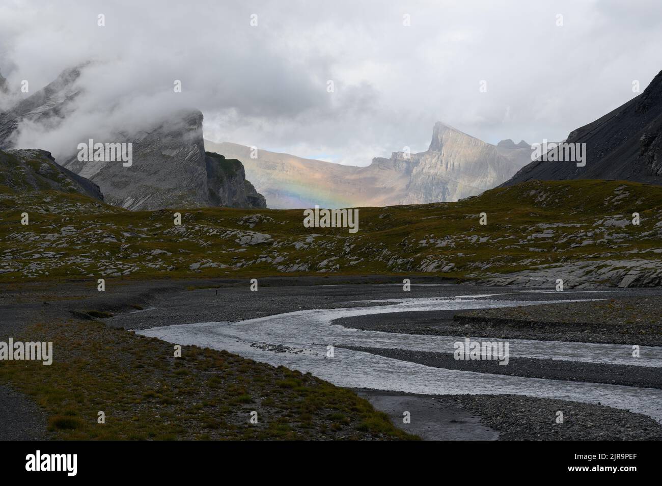 rainbow on Gemmi Pass in Valais Stock Photo - Alamy