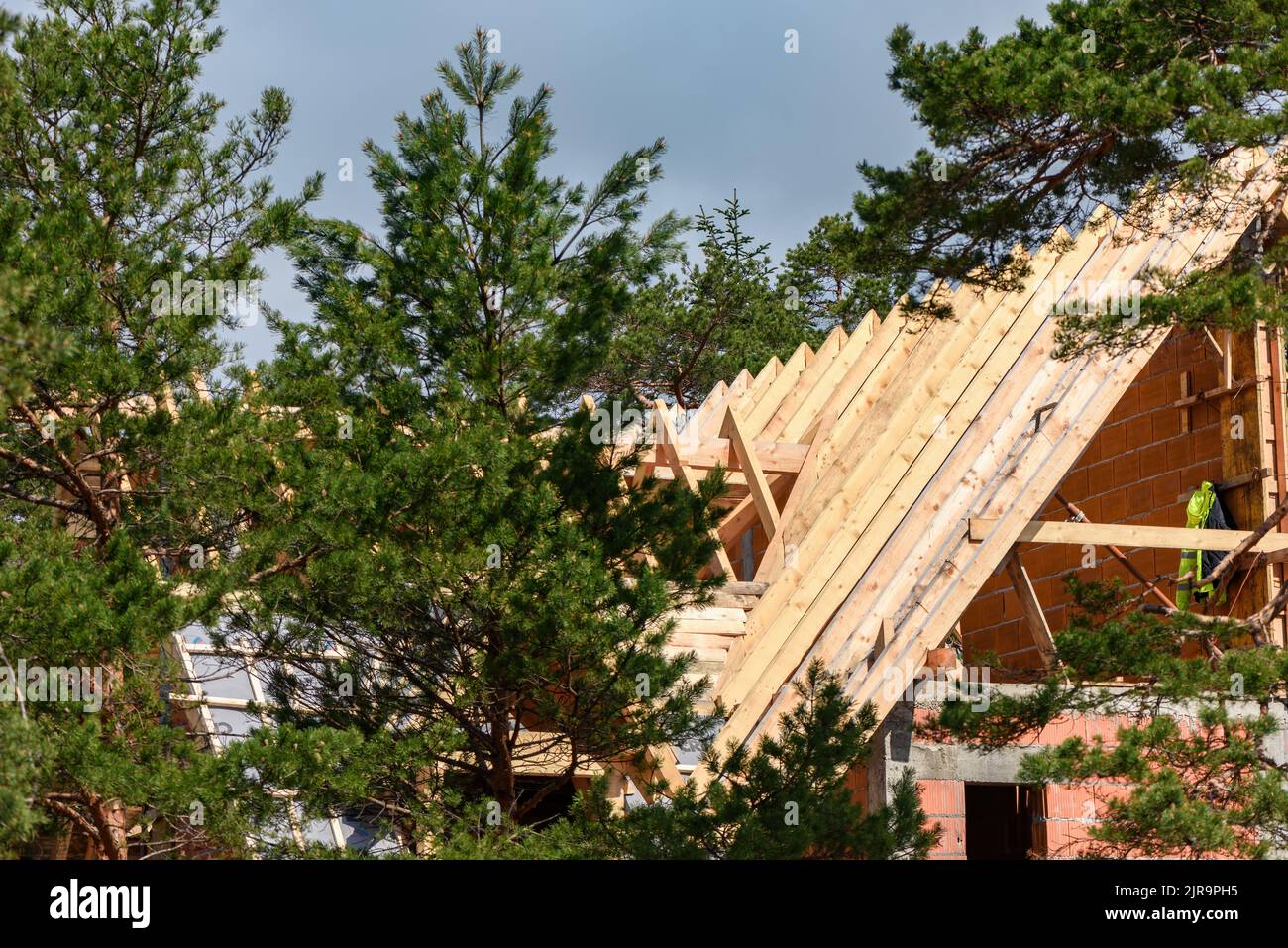 Wooden beams for house roof construction, building a new home Stock ...