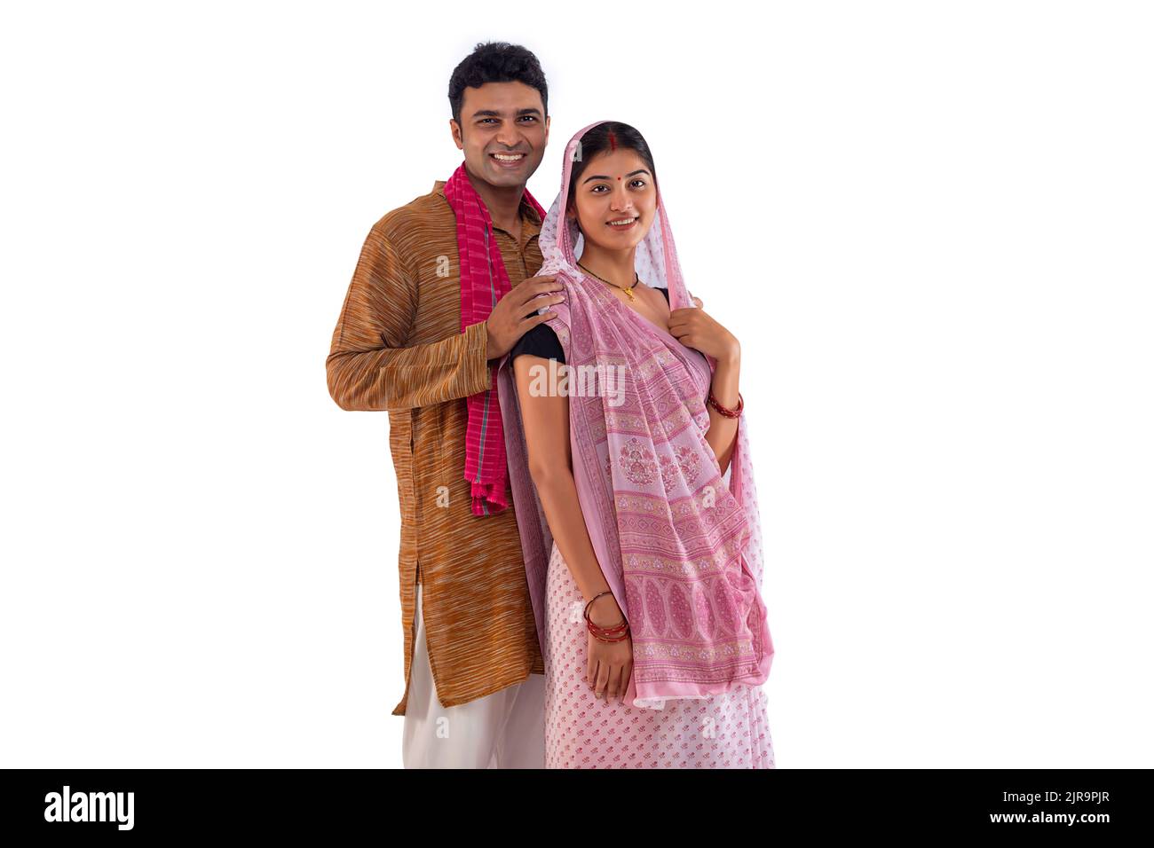 Portrait of a Bihar couple standing against white background Stock ...