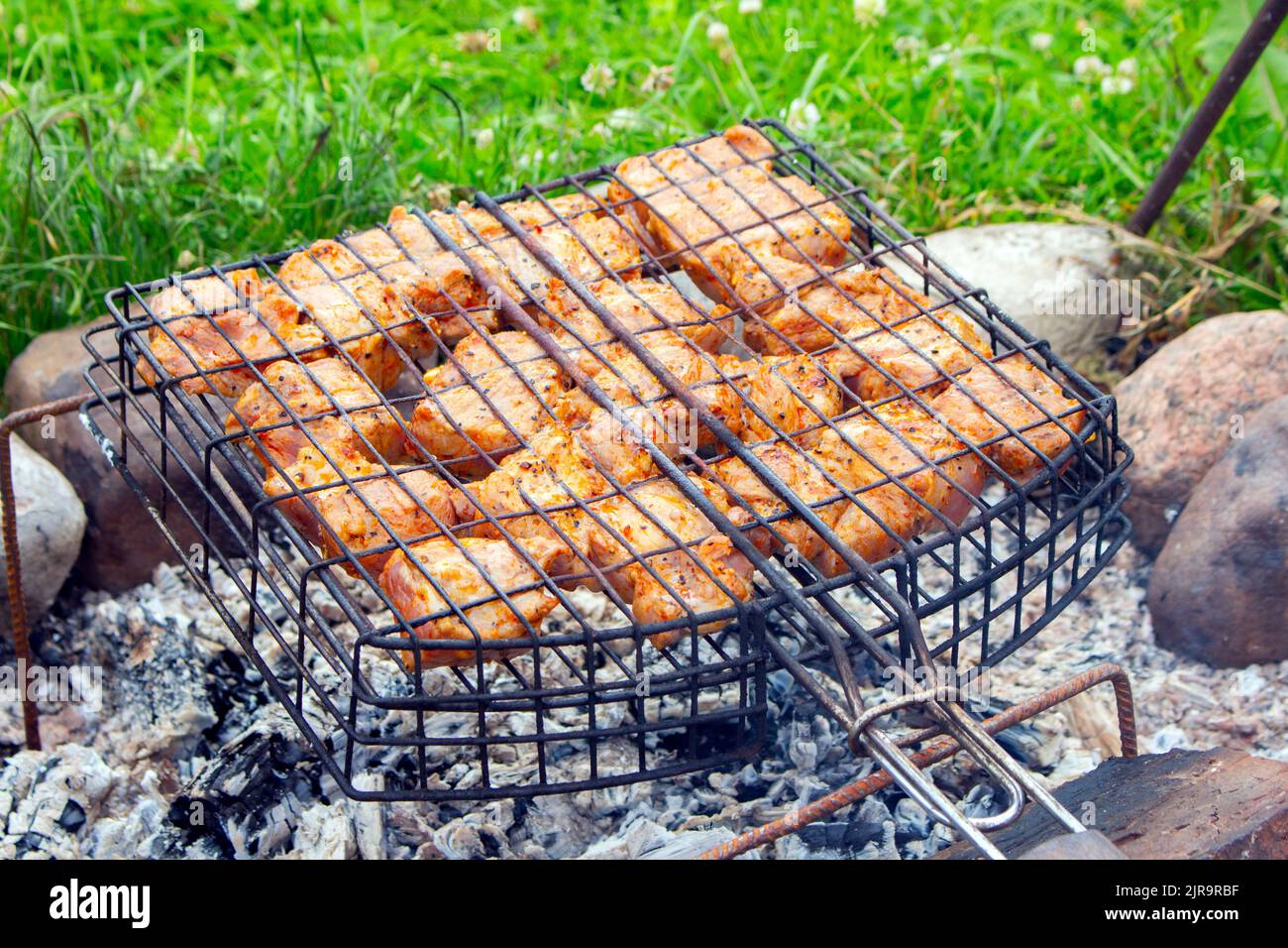 Chicken white meat barbecue frying on a country grill Stock Photo - Alamy