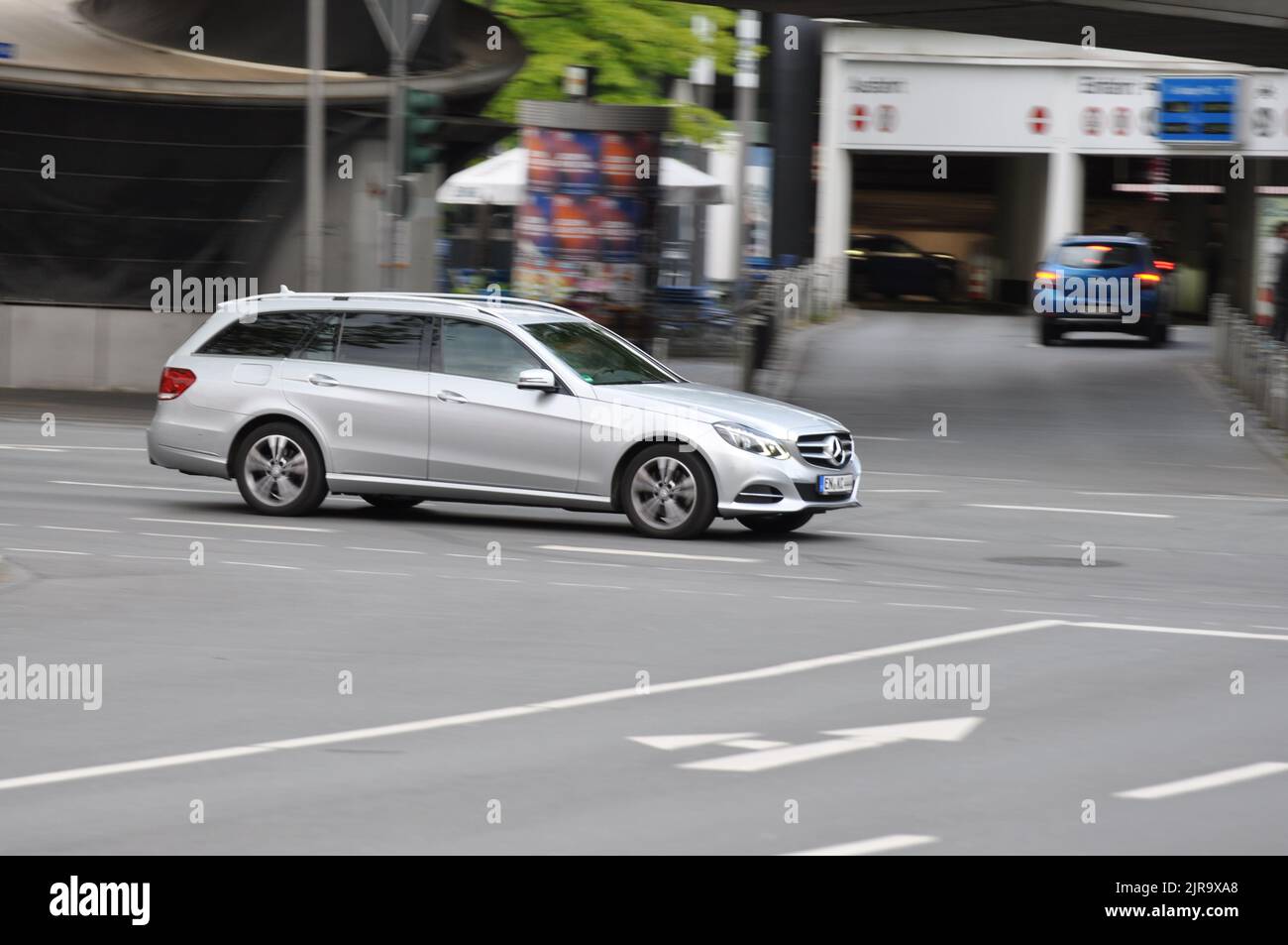 A silver Mercedes E-Class (S 212) facelift while driving on ...