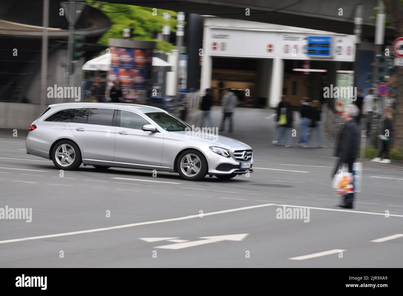 A silver Mercedes E-Class (S 212) facelift while driving on ...