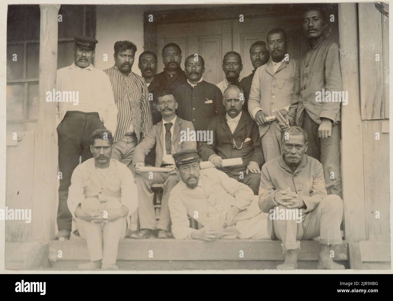 Cook Islander and European men on a verandah. From the album: Cook ...
