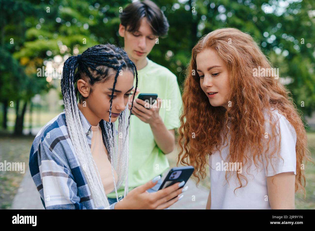 Three caucasian modern teenagers pleased to get many positive reactions ...