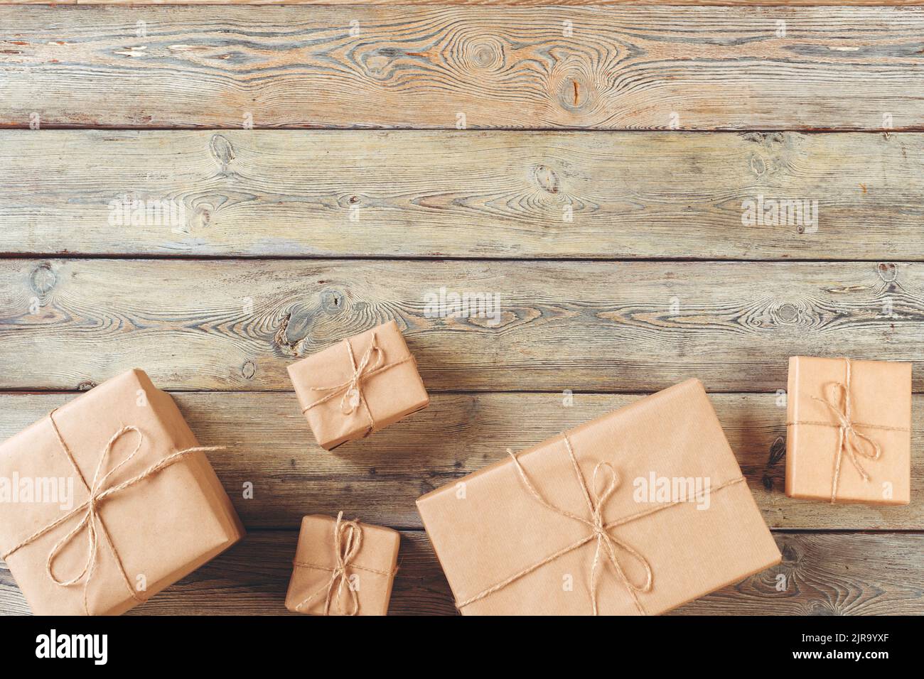 various gift boxes on wooden table, top view Stock Photo - Alamy