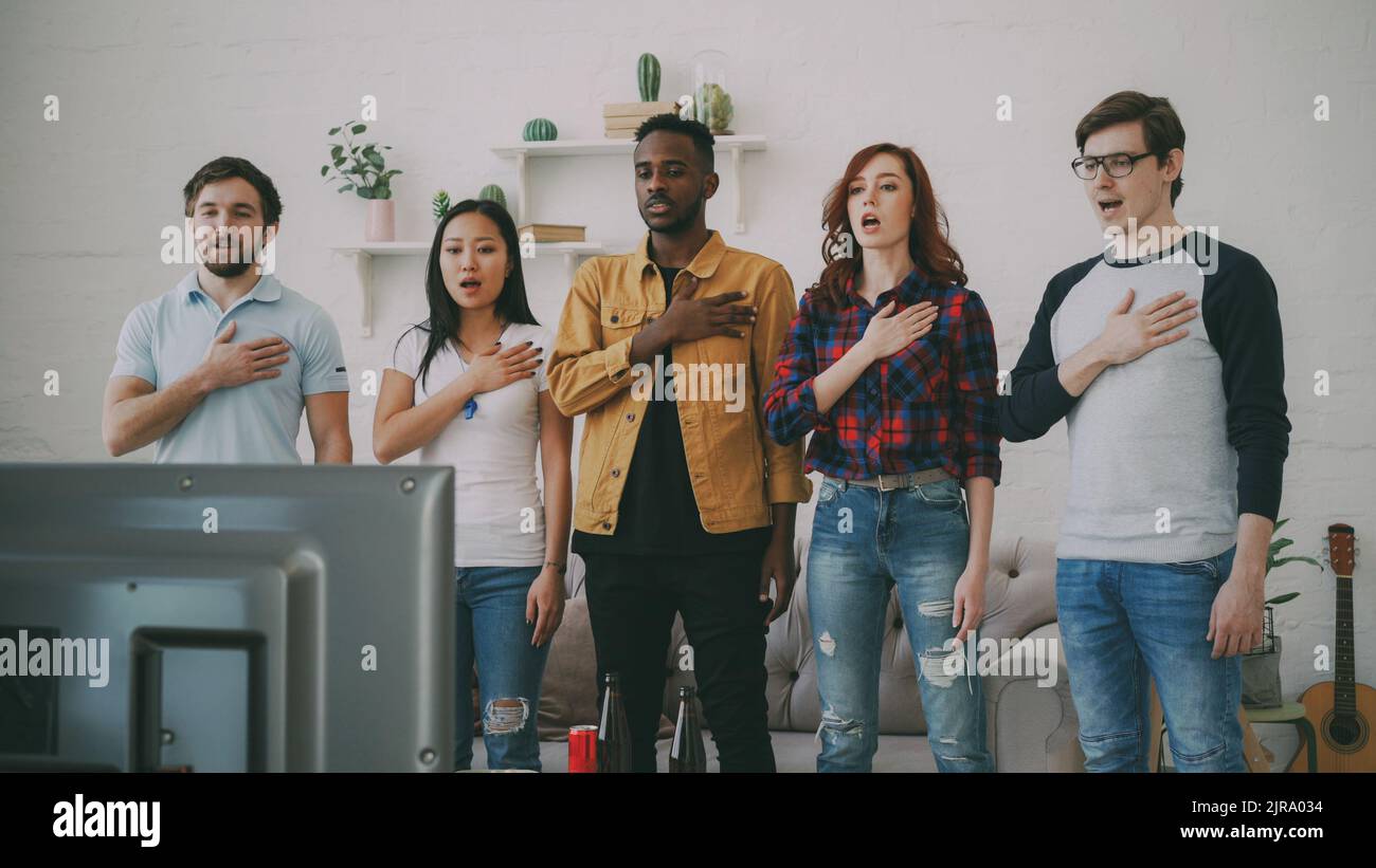 American football fans sing the american national anthem hi-res stock ...