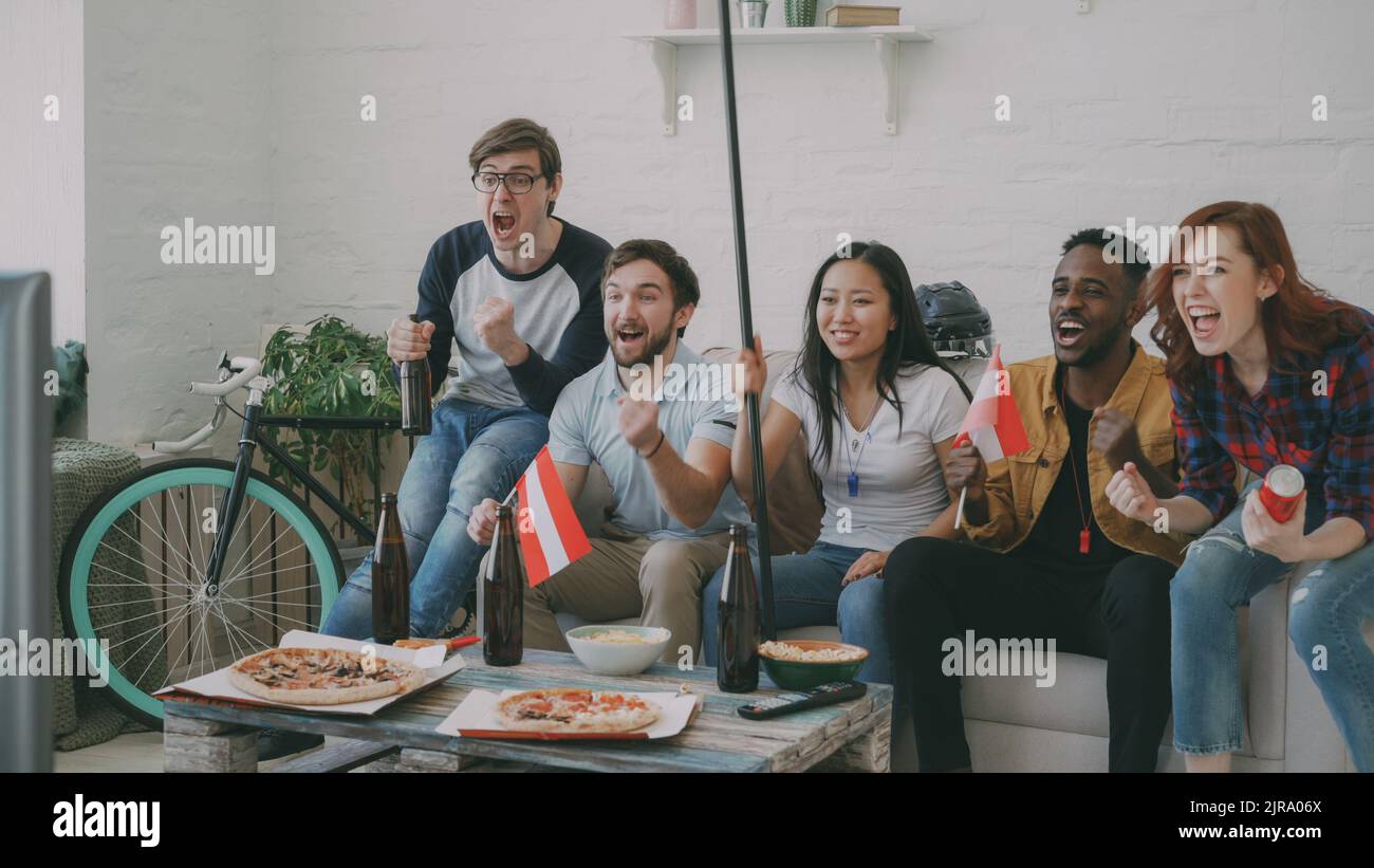 Happy friends austrian flags watching hi-res stock photography and ...