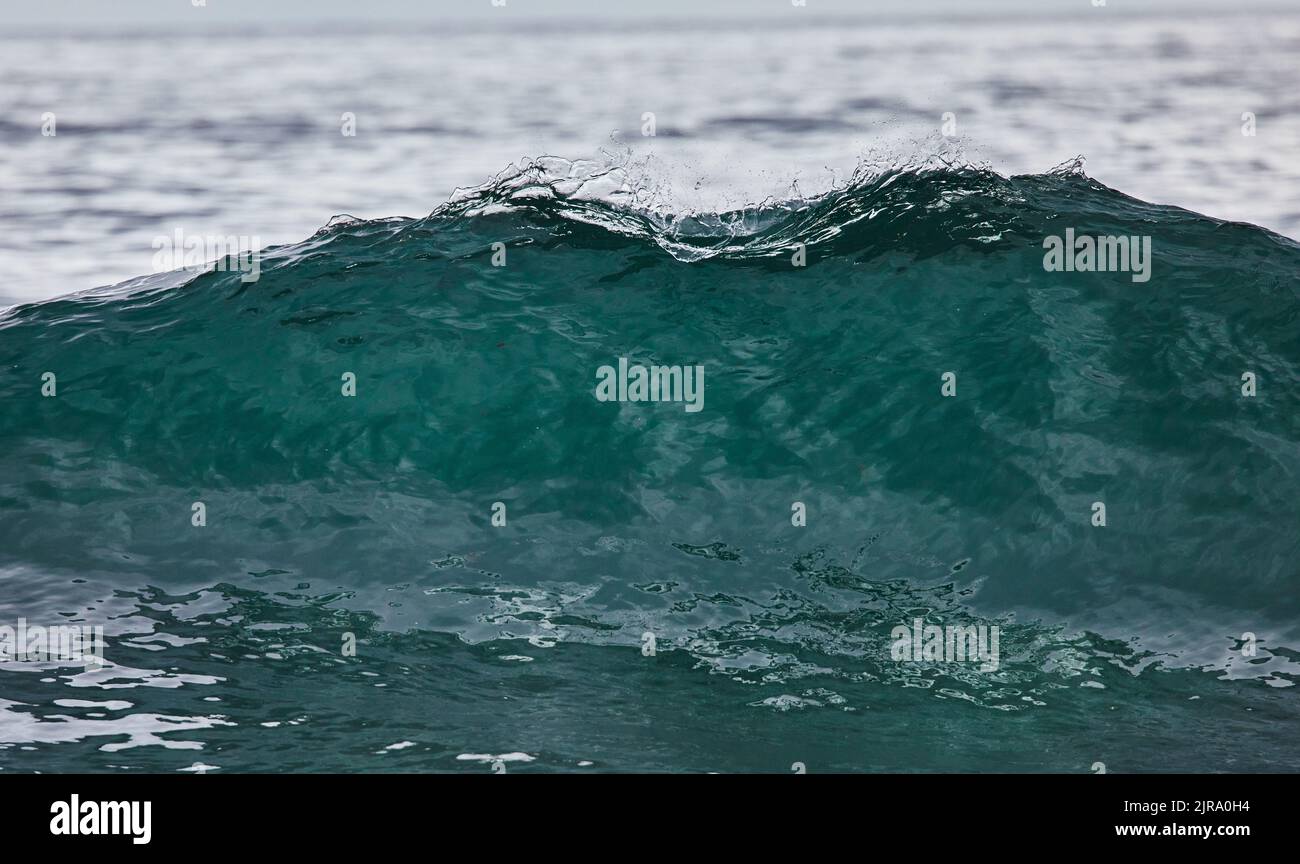 A closeup shot of the Caribbean Sea waves in the daylight in Puerto ...