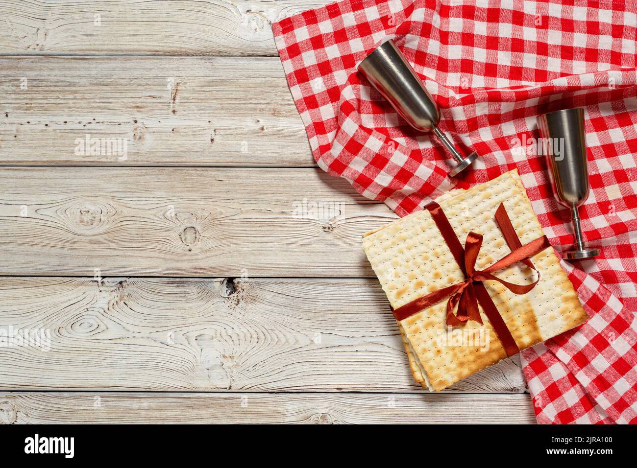 Jewish holiday Passover banner design with wine, matzo on wooden background Stock Photo - Alamy