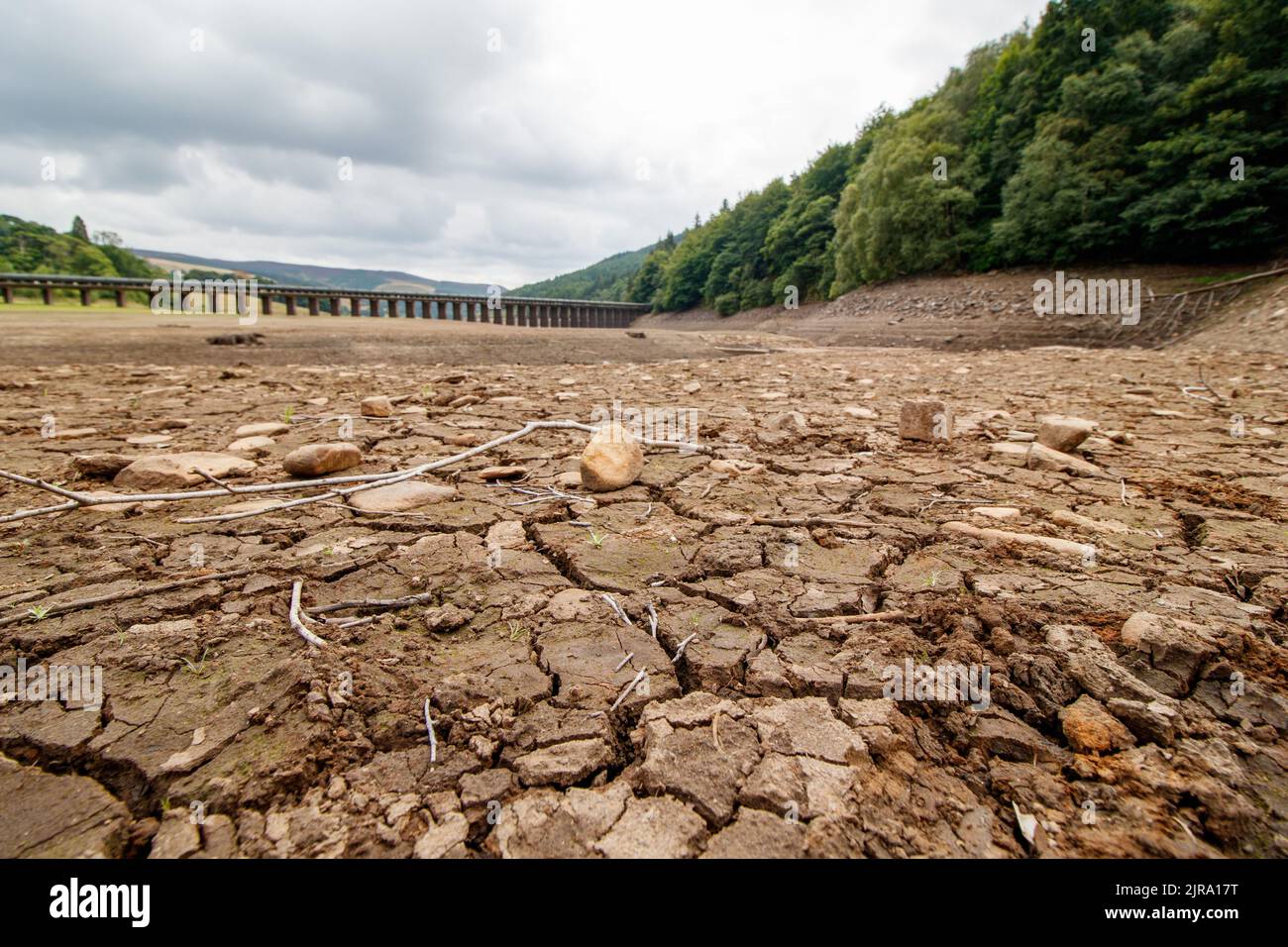 The water level is reduced to a small stream at the Upper end of the ...