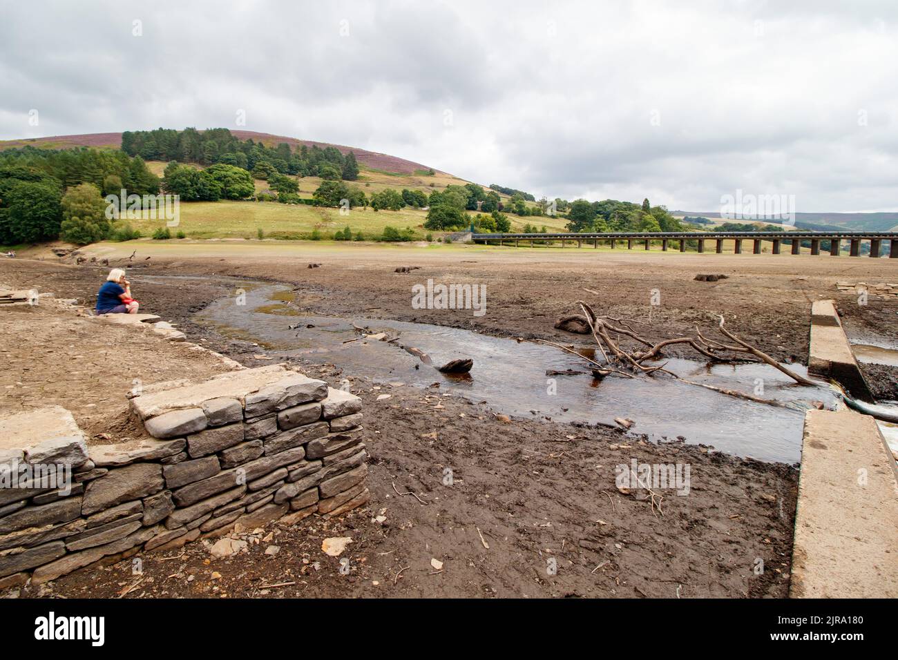 The water level is reduced to a small stream at the Upper end of the ...