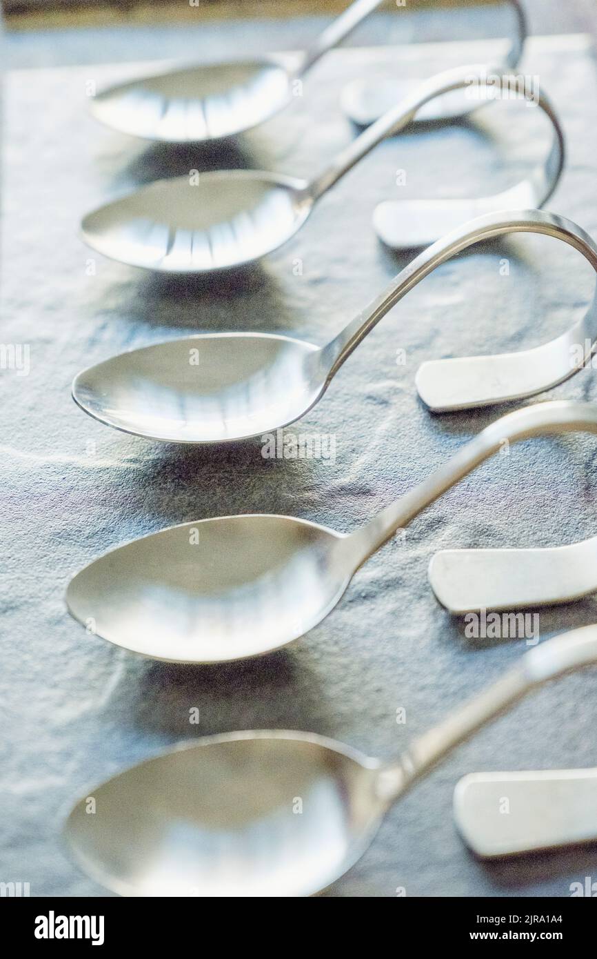 Silver bent spoon hi-res stock photography and images - Alamy