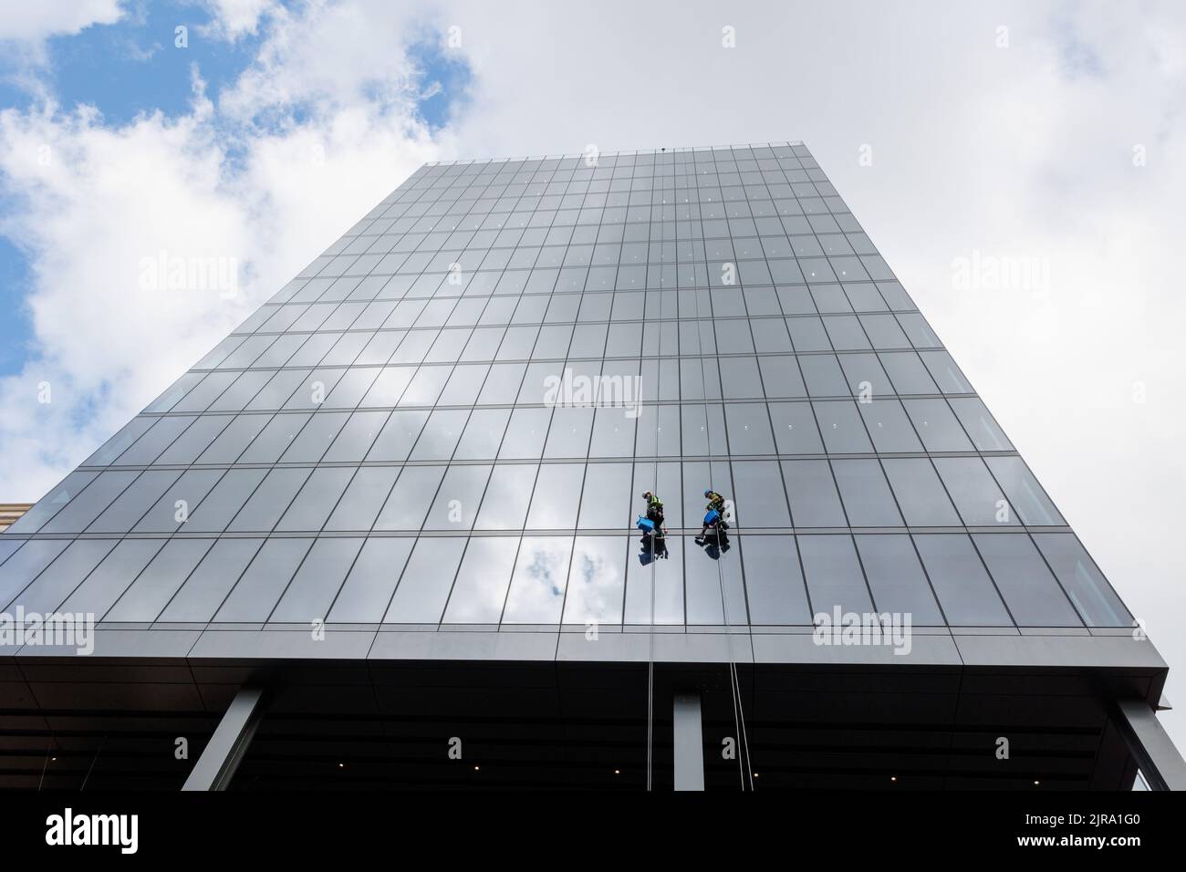 Two window cleaners working on 103 Colmore Row, the highest, tallest ...