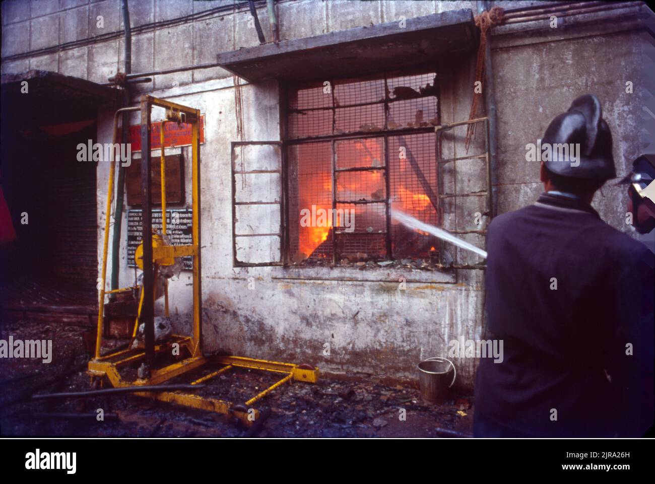 Fire fighter spraying and dousing at Kurla, MumbaiF Stock Photo - Alamy