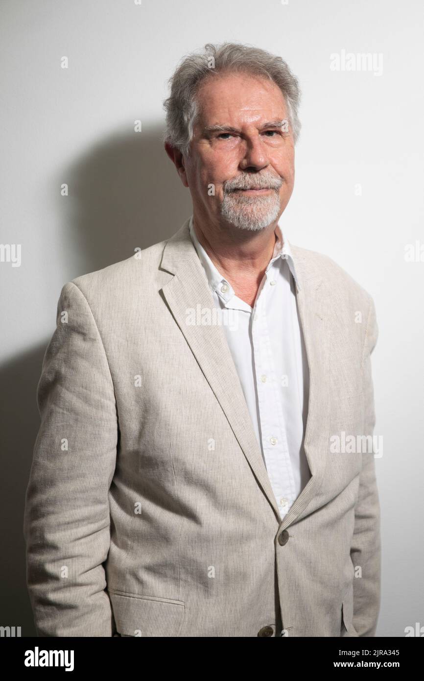 Realisator Thierry Michel poses for the photographer during a press ...