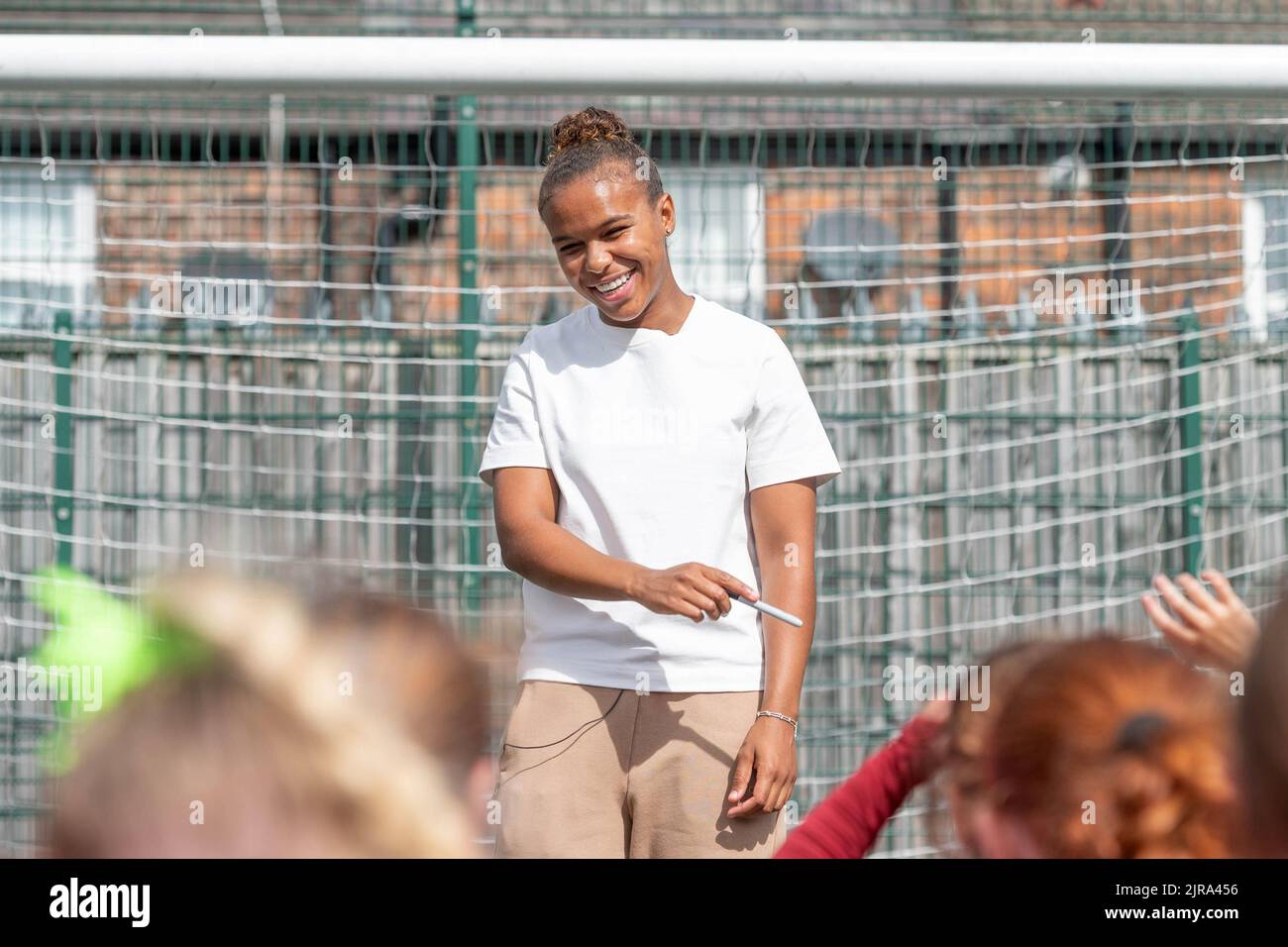 EDITORIAL USE ONLY England footballer Nikita Parris delivers a surprise ...