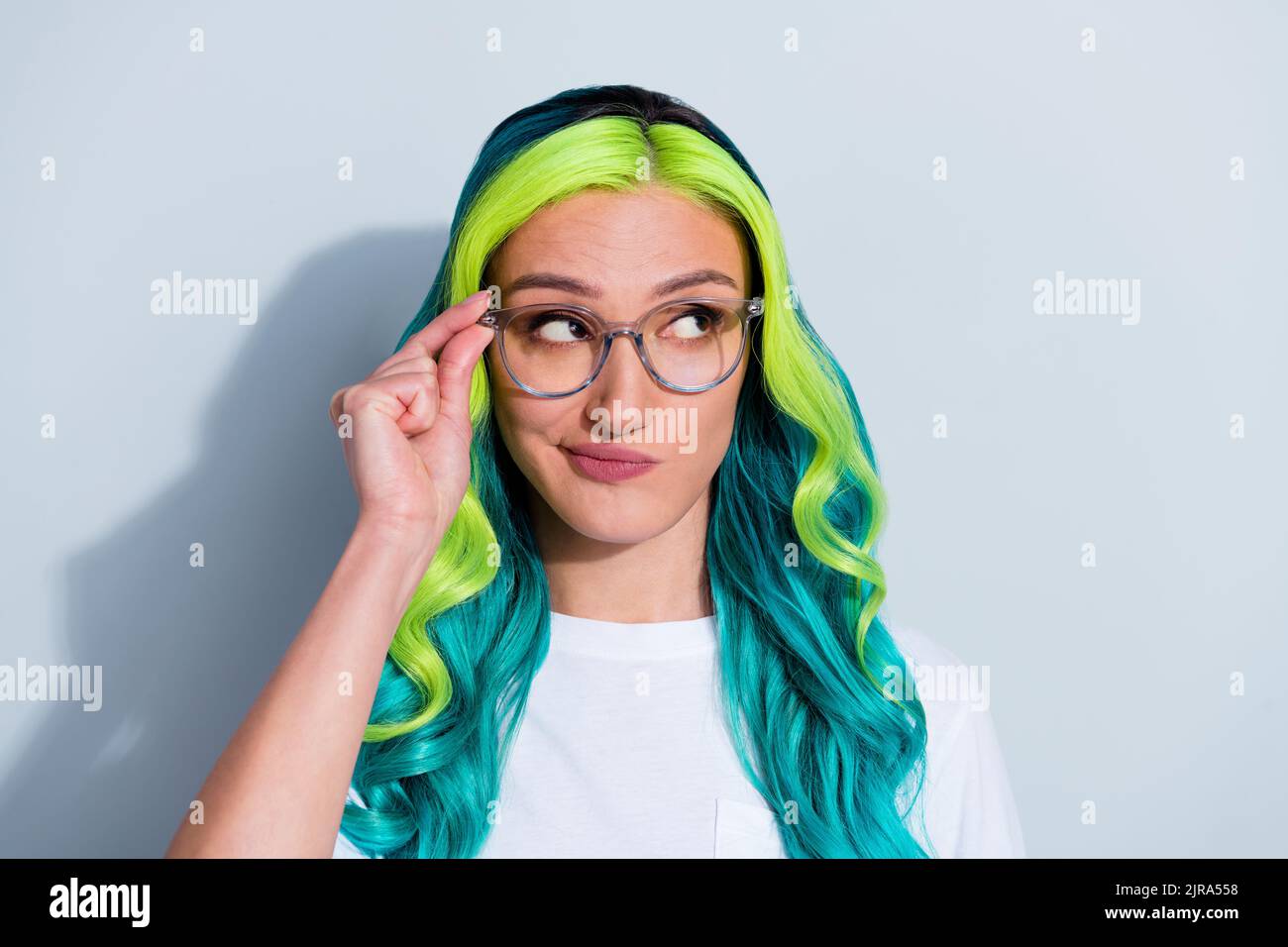 Photo of cute suspicious vibrant gradient hair girl dressed t-shirt arm ...