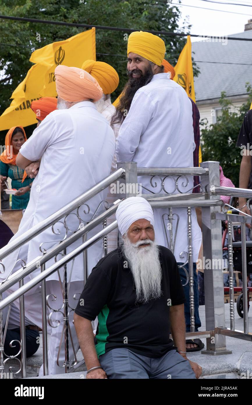 Men in turbans gather on the steps of the Sikh Cultural Center prior to ...