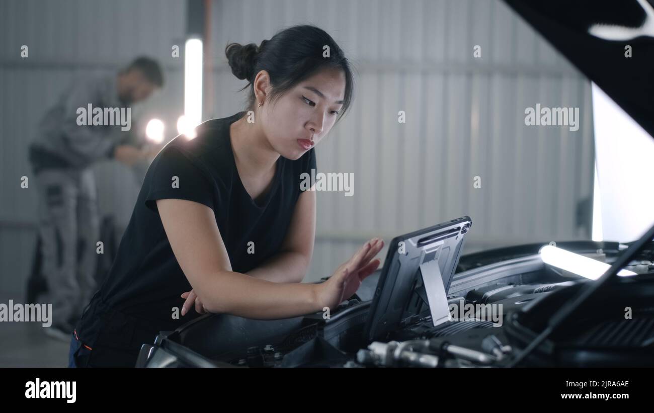 Female manager on car factory hi-res stock photography and images - Alamy