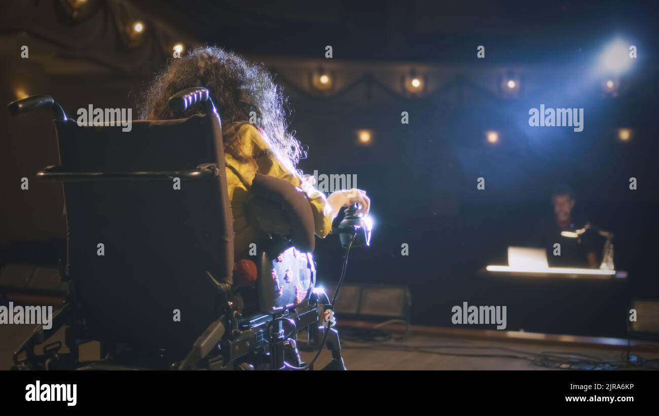 A disabled actress with spinal muscular atrophy in a wheelchair on a ...
