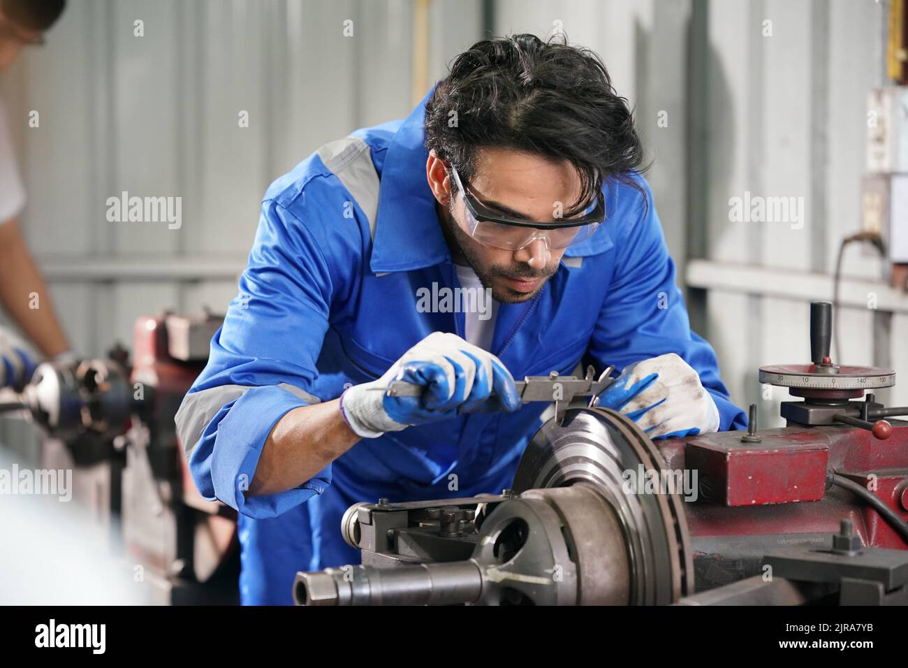 Workers changing repair part hi-res stock photography and images - Alamy