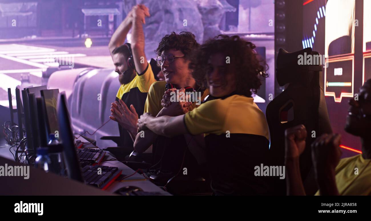 Anxious teenager esportsman game player in glasses playing video game ...