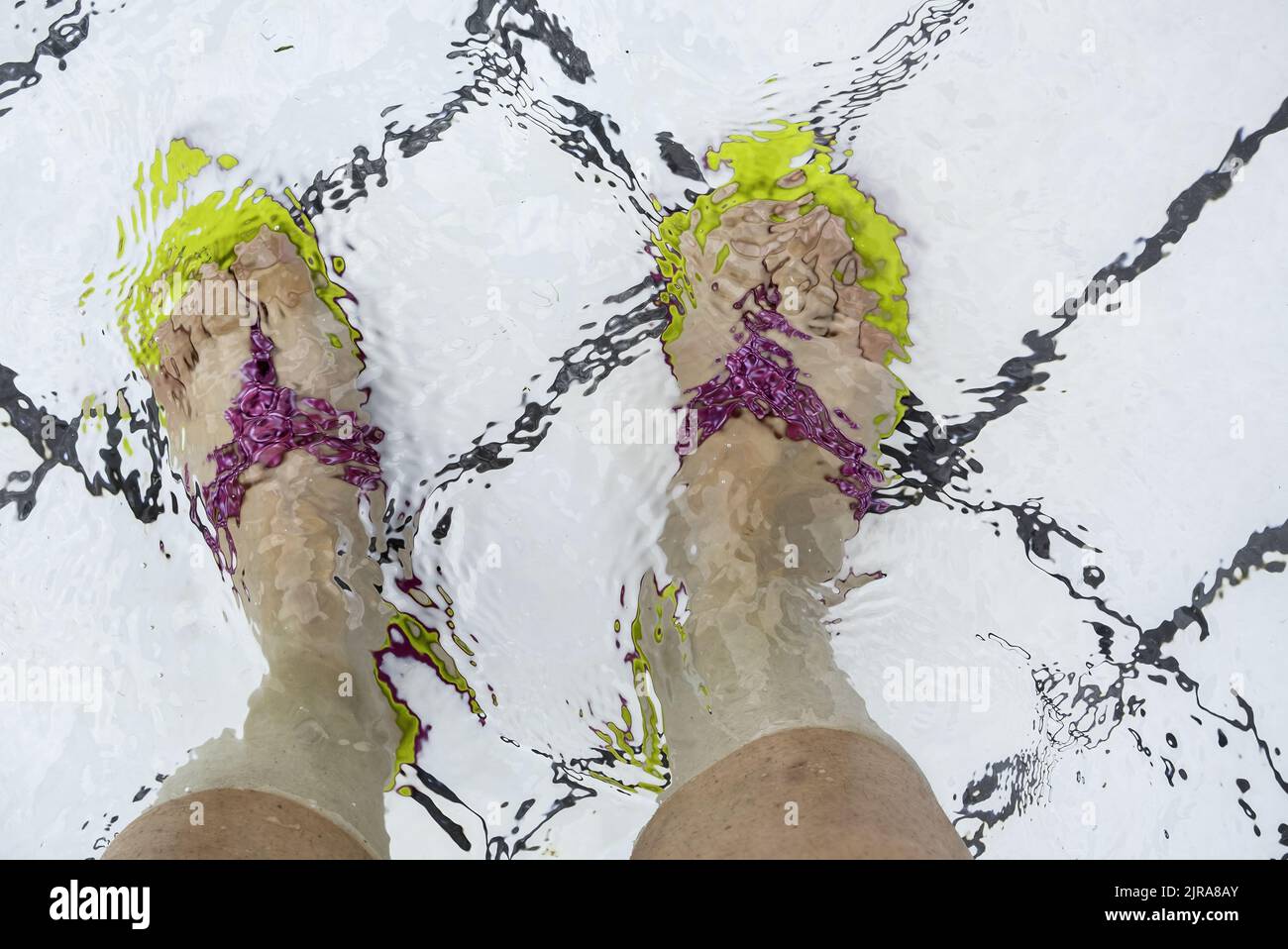 Detail of woman's feet in a pool, summer vacation Stock Photo - Alamy