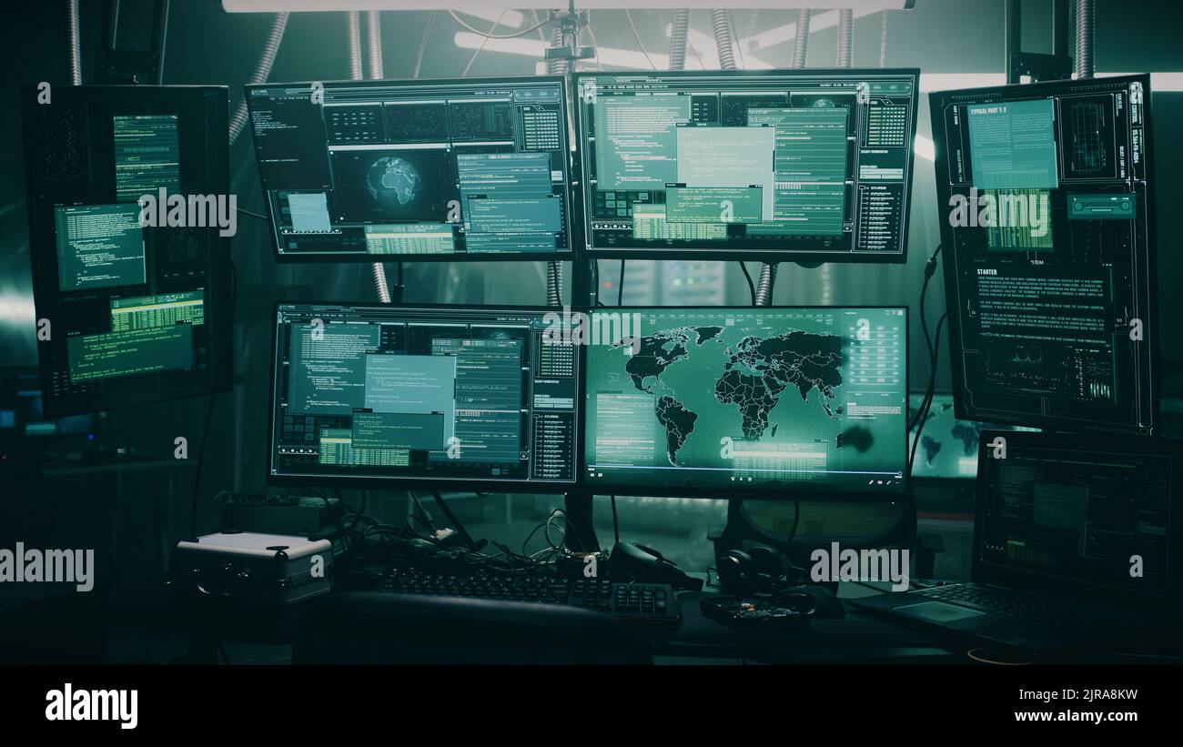 Pan around view of modern computer monitor with world map and various data located on desk in ...