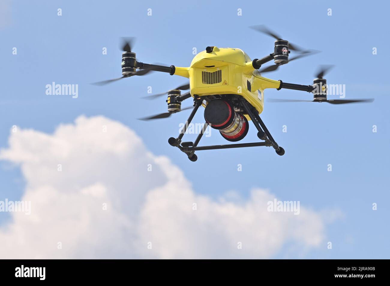 Illustration shows a press moment called 'First drone flight with human ...