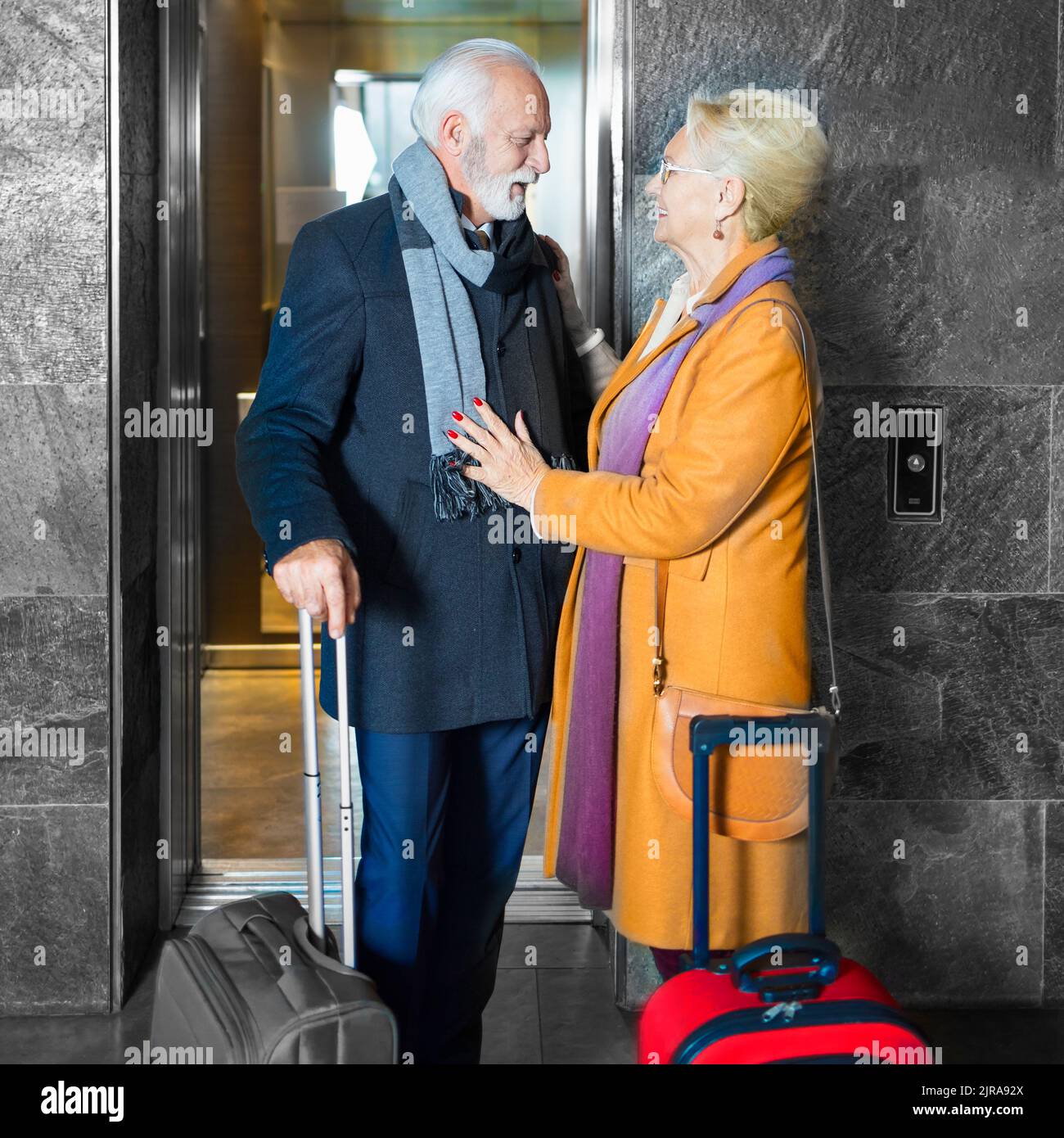 Elderly man and woman caring for each other Stock Photo - Alamy