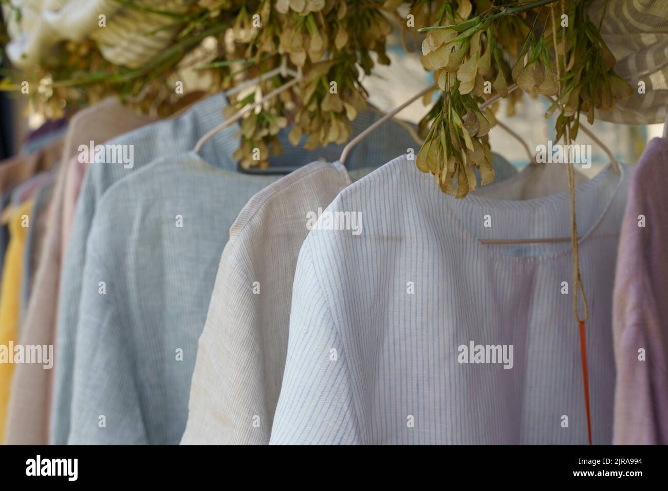 Organic eco clothes on a hanger. Home-made clothing from natural and ...