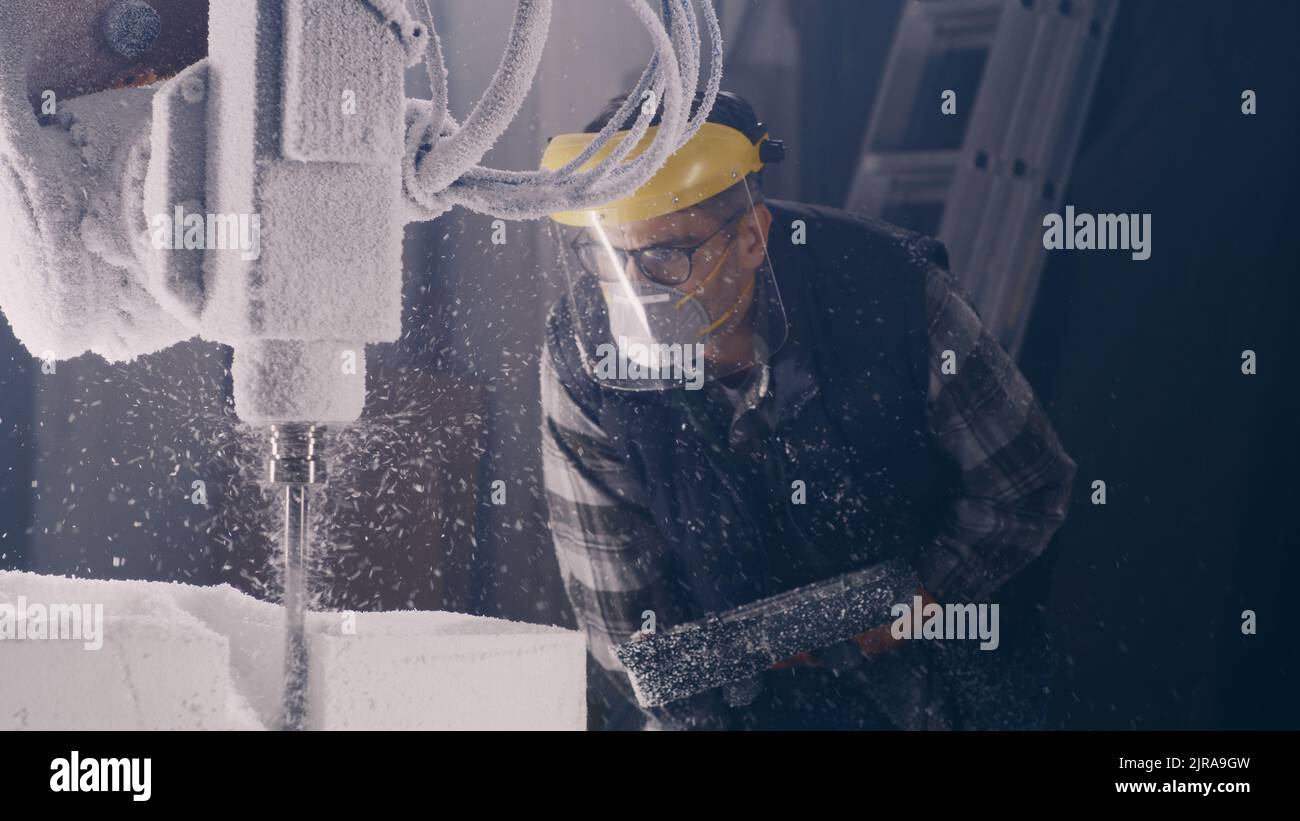 Craftsman in respirator and protective face shield using remote control ...