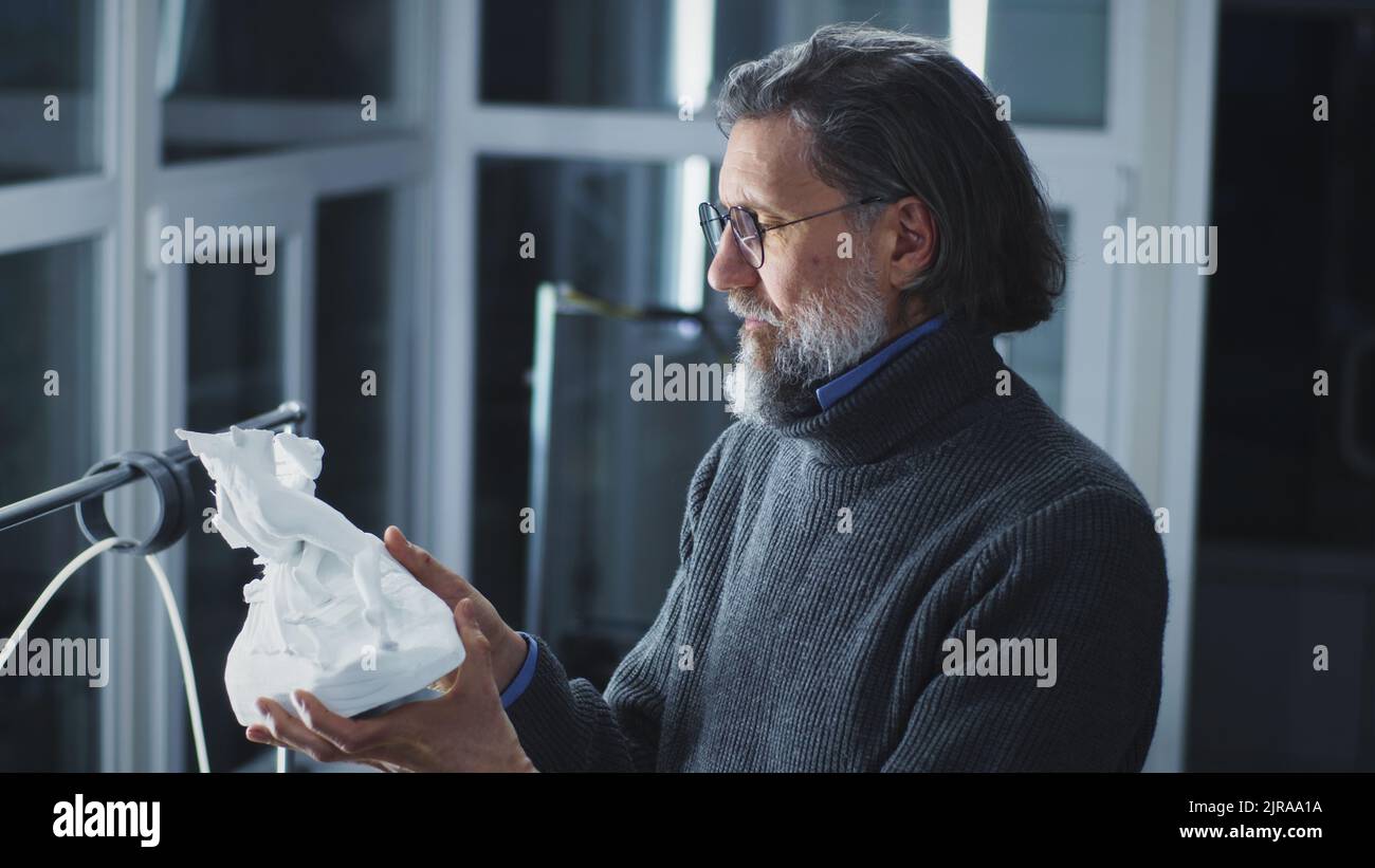Male designer inspecting 3d model hi-res stock photography and images ...