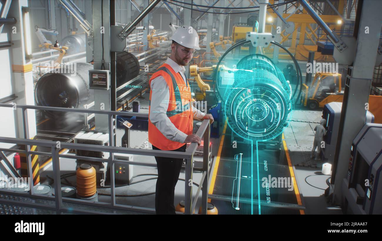 An engineer on a high-tech robotic line for the production of aerospace ...