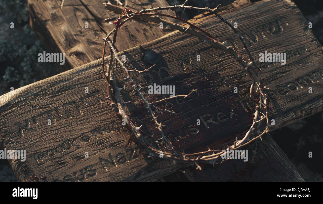 From above crown of thorns placed on stain of blood and wooden ...