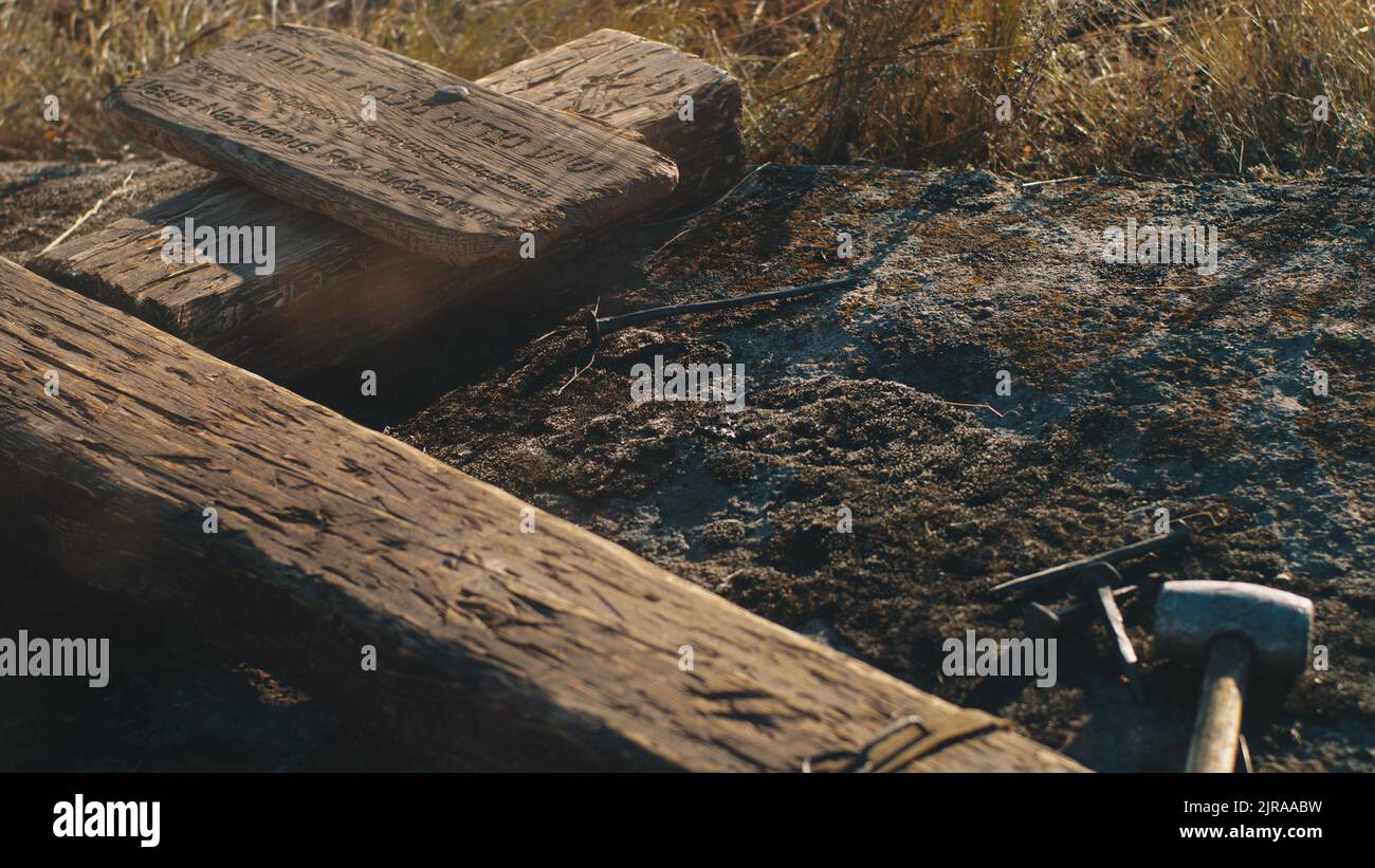 High angle of lumber cross for Jesus Christ execution placed on ground ...